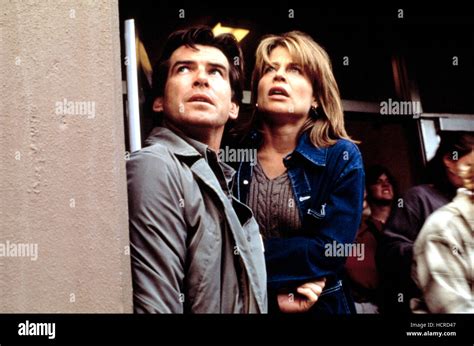Dantes Peak Pierce Brosnan Linda Hamilton 1997 C Mca Courtesy