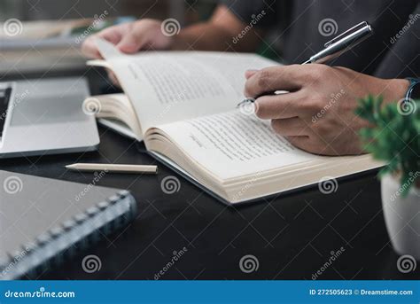 Learning Online Class By Using Laptop Computer And Writing Notebook At