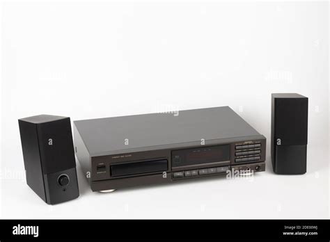 CD Player Stereo Hi Fi And Two Stereo Speakers High End Audio Equipment On White Background