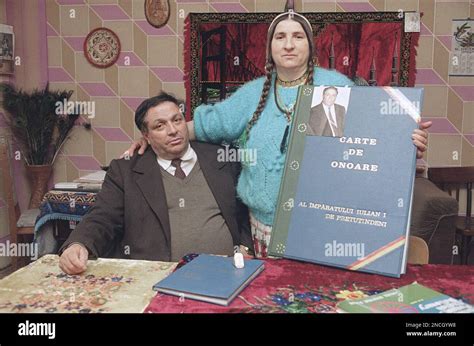 Emperor Iulian Radulescu With His Wife Veroleana At Home In Sibiu Romania Display The Book