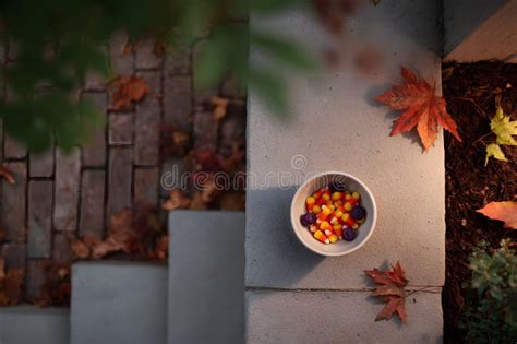 Colorful Candy Bowl On A Step During Halloween Night Generative Ai