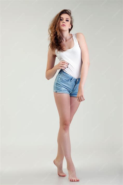 Premium Photo Studio Shot Of Leggy Model Posing At Camera