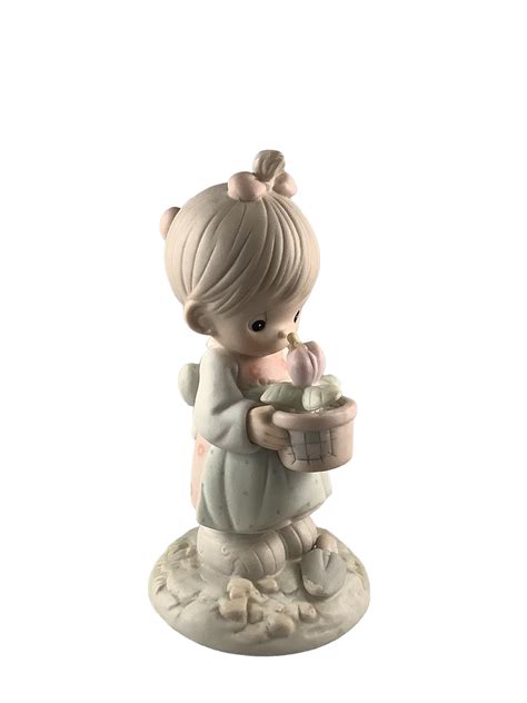 May Precious Moment Figurine
