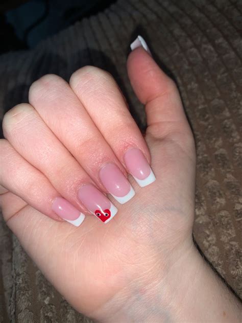 French Nails With Design On Ring Finger