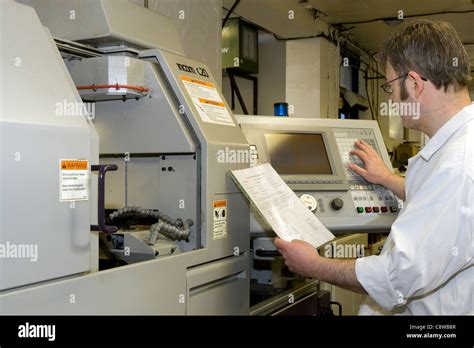Cnc Lathe Operator Programming In Data Setting Up A Task Stock Photo