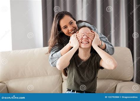 Two Girlfriends Are Playing Hide And Seek Stock Photo Image Of Home Colorful