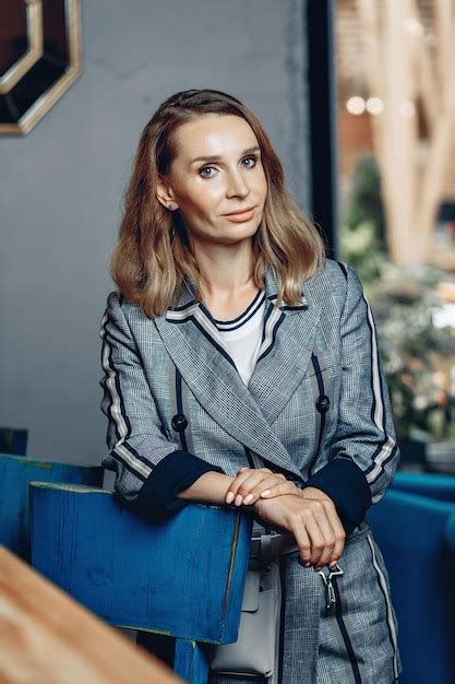 Premium Photo Portrait Of A Sexual Beautiful Lovely Model Wearing Sexy Costume And Sitting At