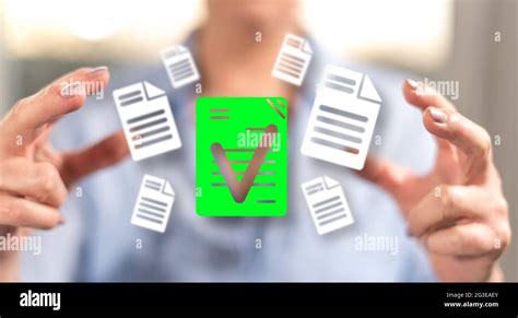 Document Validation Concept Between Hands Of A Woman In Background Stock Photo Alamy