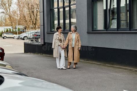 A Mature Beautiful Lesbian Couple Walking Stock Image Image Of