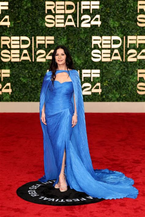 Catherine Zeta Jones Stuns In Thigh Split Gown For Rare Outing With