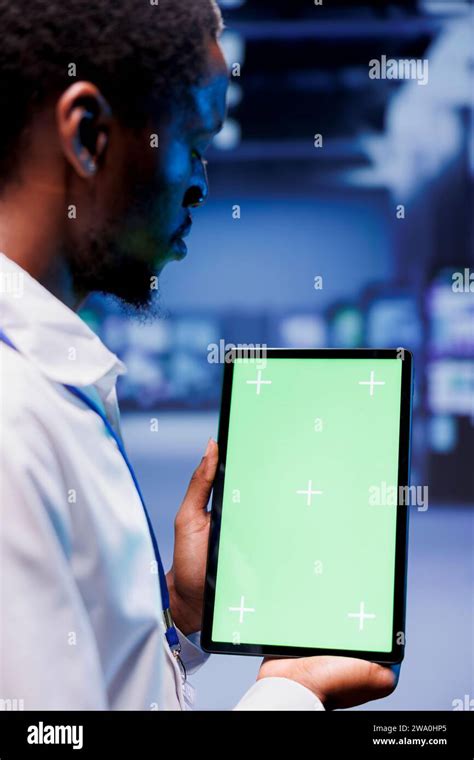 Specialist Investigating Performance Trends In Data Center Mainframes Manager Using Chroma Key