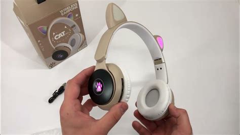 Відео огляд Бездротові навушники St77 Led з котячими вушками що світяться Колір золотий