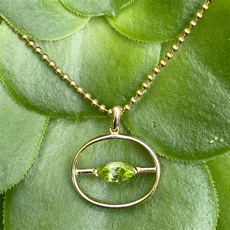 Peridot Marquise Theta Pendant On 24 Ball Chain All In 18 Karat