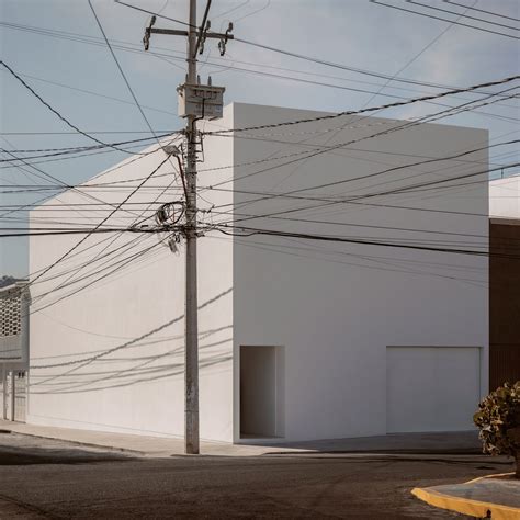 Bhy Arquitectos Arranges Multiple Courtyards In White Argentinian House