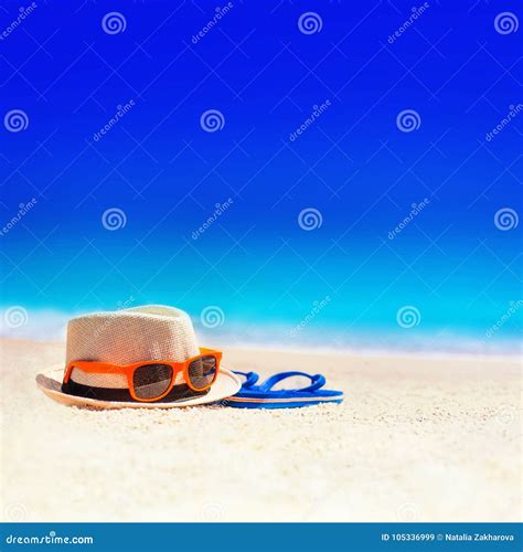 Flip Flops Beach Hat Sun Glasses On The Sand Summer Vacation Stock