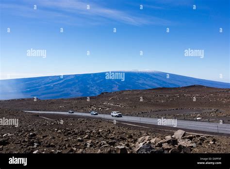 Cars On Mauna Kea Summit Road Mauna Loa In Background Big Island Of