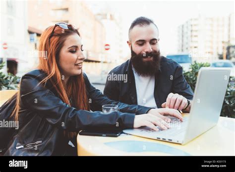 Couple Using Laptop Stock Photo Alamy