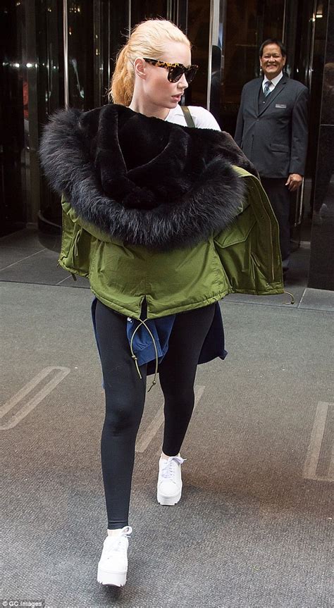 Iggy Azalea Turns Heads As She Steps Out In New York City Wearing Her Winter Parka Backwards