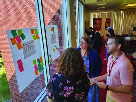 jam participants engaging in the gallery walk activity at the