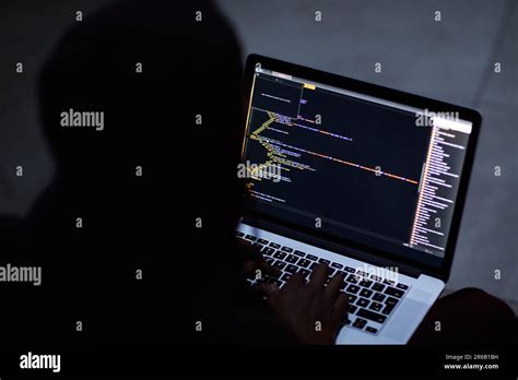 Hacker Code And Cyber Security With Person And Laptop Screen For Ransomware Programming And