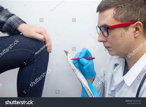 Woman Suffers Knee Pain Examination By Stock Photo 1852669081 Shutterstock