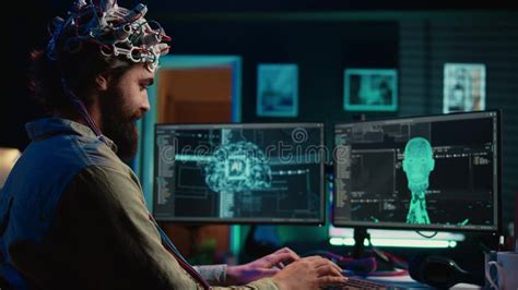 It Admin Coding And Using EEG Headset To Upload Brain Into Computer Stock Video Video Of