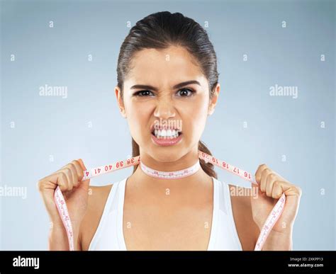 Angry Woman And Portrait With Measure Tape And Choke From Difficult Diet Weight Loss Issue And