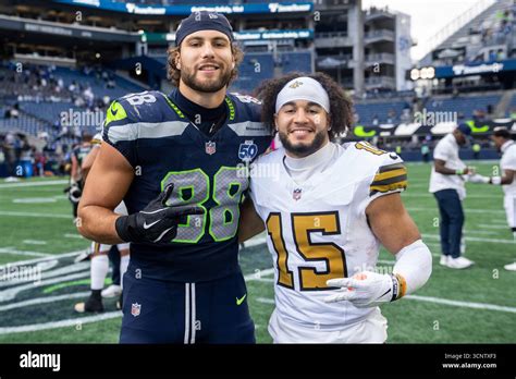 Seattle Seahawks Tight End Aj Barner Left And New Orleans Saints Wide