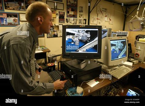 Nasa Scientist On A Computer