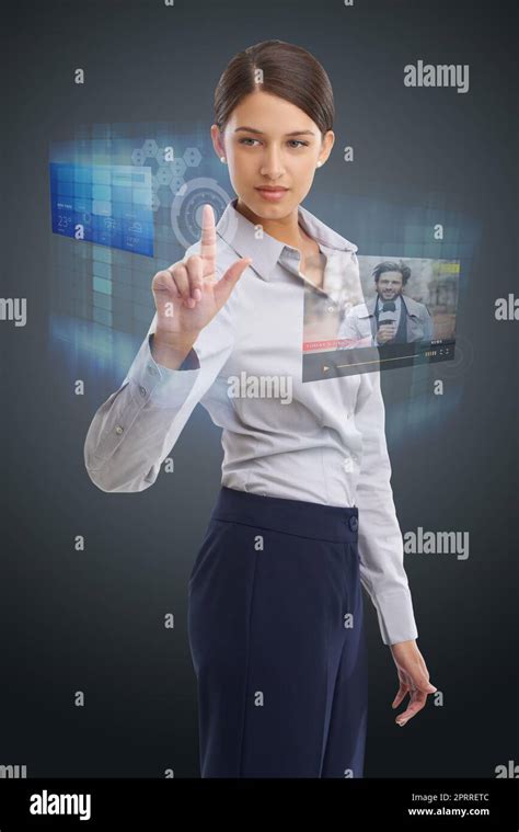 Lets See What The Weatherman Has To Saya Businesswoman Using A Digital Interface To Look At A