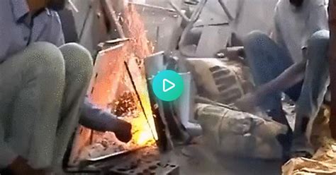 An African Blacksmith Using Cement Bags As Bellows  On Imgur