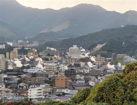 Beppu Cityscape With Steam Rised From Public Baths And Onsen Hot