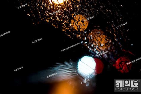 Car Headlamps And Street Lights At Night Create Bokeh Style Defocused