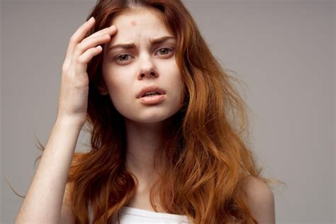 Premium Photo Redhaired Woman Cosmetology Skin Care Puberty Light Background High Quality Photo