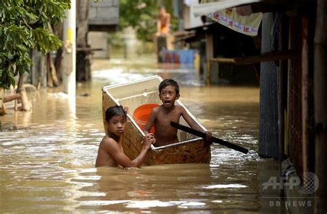 比国家災害宣言死者35人に 台風27号後も洪水被害 写真8枚 国際ニュースAFPBB News