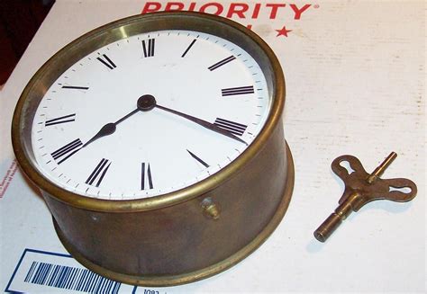 Antique Waterbury Clock Co Brass Wall Clock