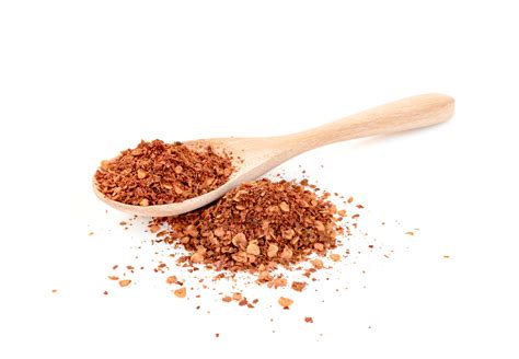 Red Ground Paprika Powdered Or Dry Chili Pepper With Wooden Spoon
