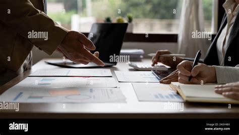 Business Team Collaboration Discussing Working Analyzing With Financial Data And Marketing