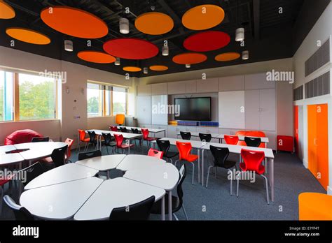 Unoccupied Babe Classroom With Colourful Acoustic Ceiling Discs Stock Photo Alamy