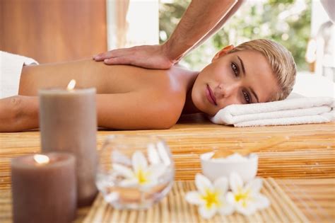 Premium Photo Woman Receiving Back Massage At Spa Center