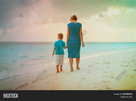 Mother And Son Walking
