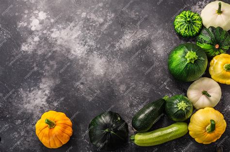 Premium Photo Summer Squashes On Textured Concrete Backdrop With Copyspace Top View