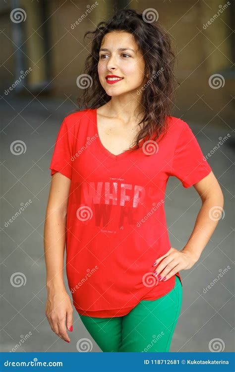 Beautiful Blackhaired Model Girl Posing For Cloth And Bags Promotion At