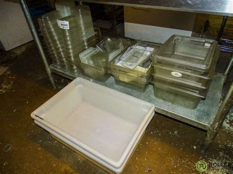 Shelf Of Plastic Inserts And Lids Assorted Sizes Roller Auctions