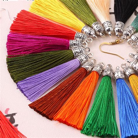 20ชิ้นเครื่องประดับพู่โลหะหมวกที่คั่นหูแขวนรถจี้จี้พัดลมจี้โทรศัพท์มือถืออุปกรณ์ ทําเอง จับคู่