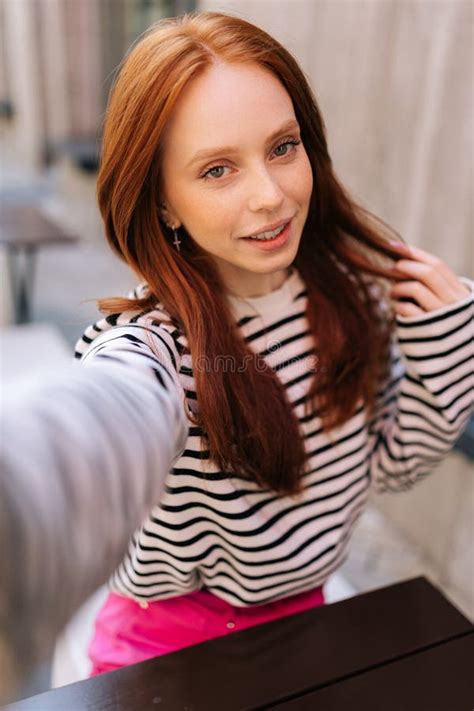 Vertical Pov Portrait Of Pretty Redhead Female Taking Selfie On