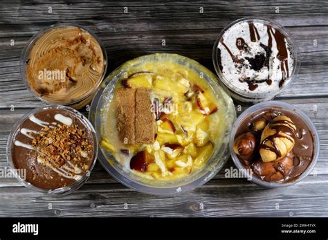 Background Of Assorted Desserts Of Chocolate Profiteroles Creamy