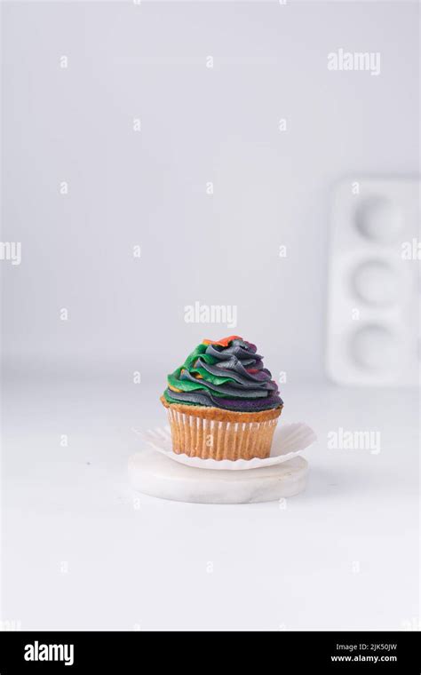 Vanilla Cupcake With Rainbow Frosting Pride Cupcakes Plain Cupcakes With White Liners And