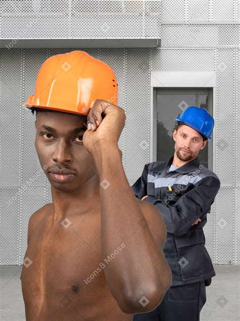 Two Men In A Construction Worker Uniform Photo