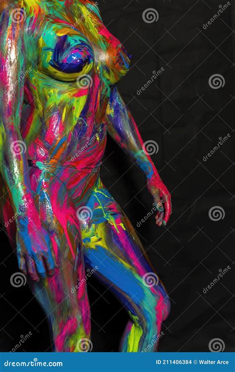 Naked Female Is Being Painted With Colorful Paint In A Home Environment
